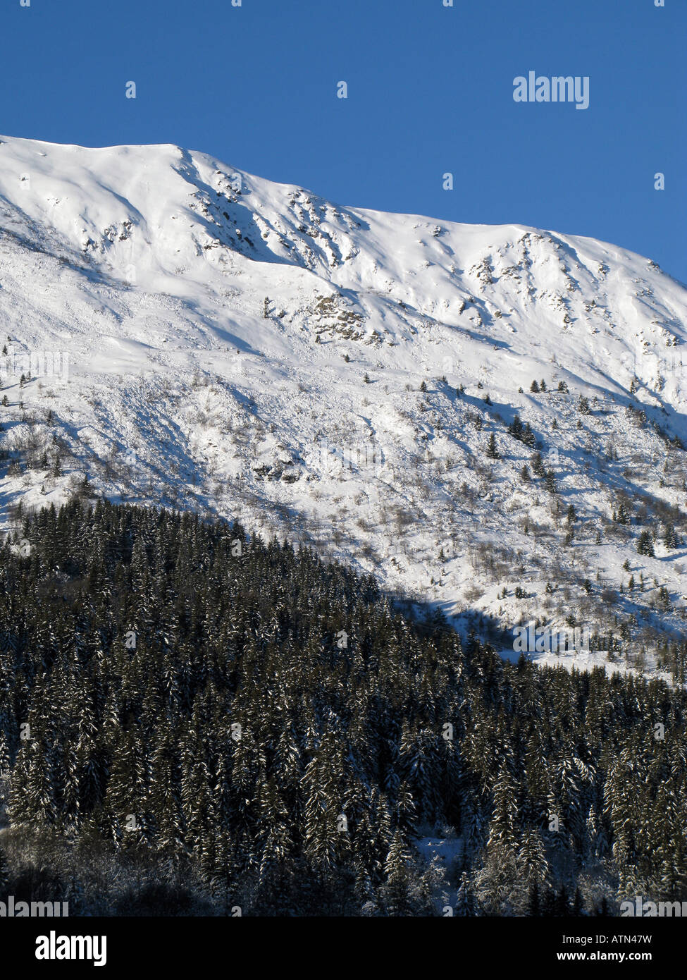 Snow covered mountains in the resort of Meribel in France Stock Photo ...