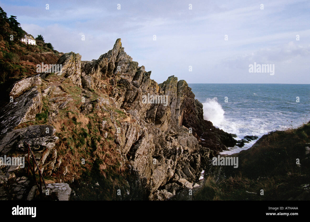 Rock formations Polperro Harbour Cornwall England Winter 2004 Stock ...