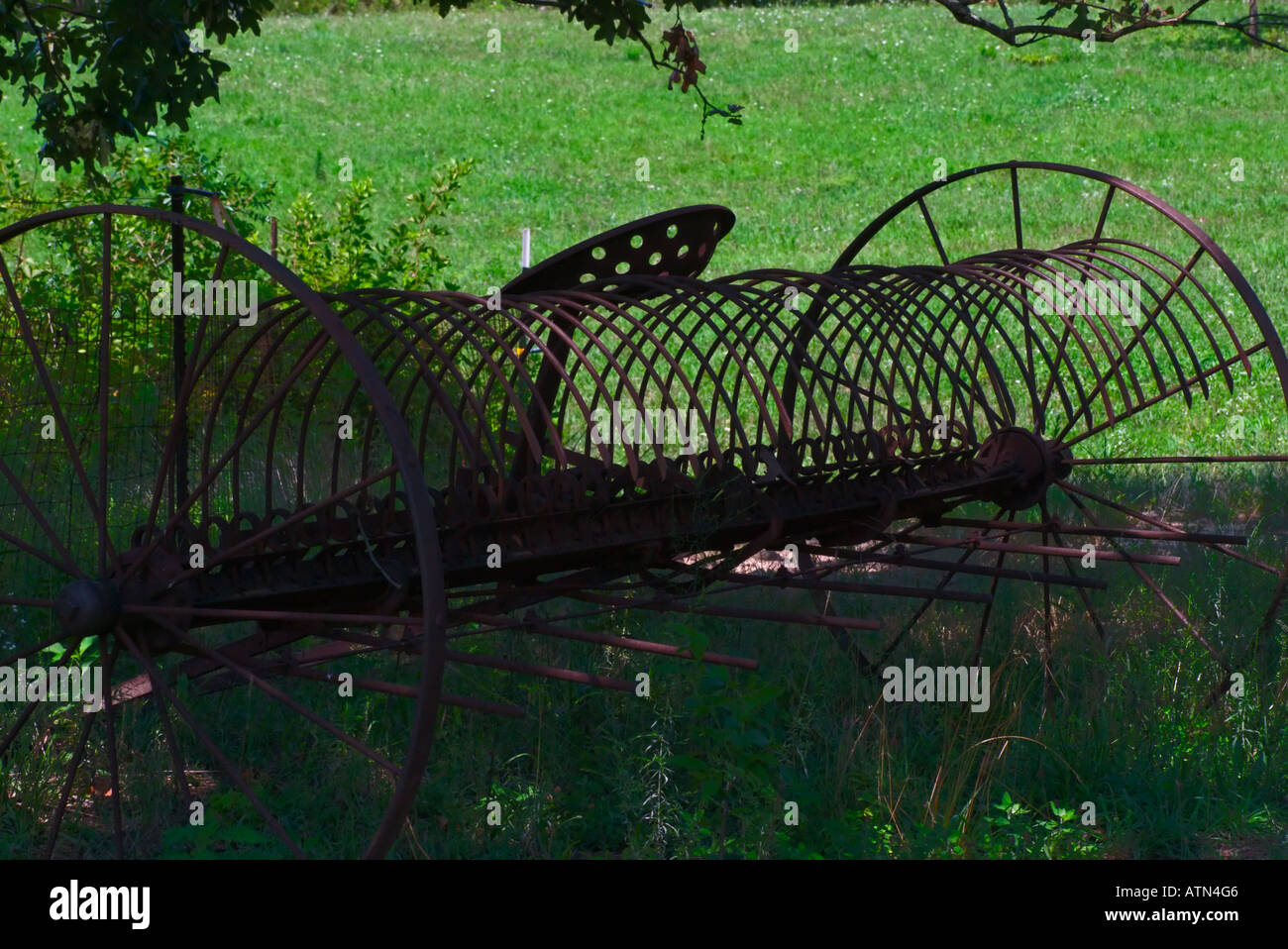 An old fashioned hay rake hi-res stock photography and images - Alamy