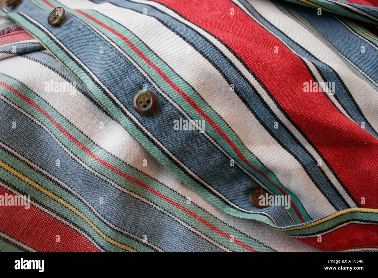 Shirt in a range of colors litted fron the back Stock Photo - Alamy