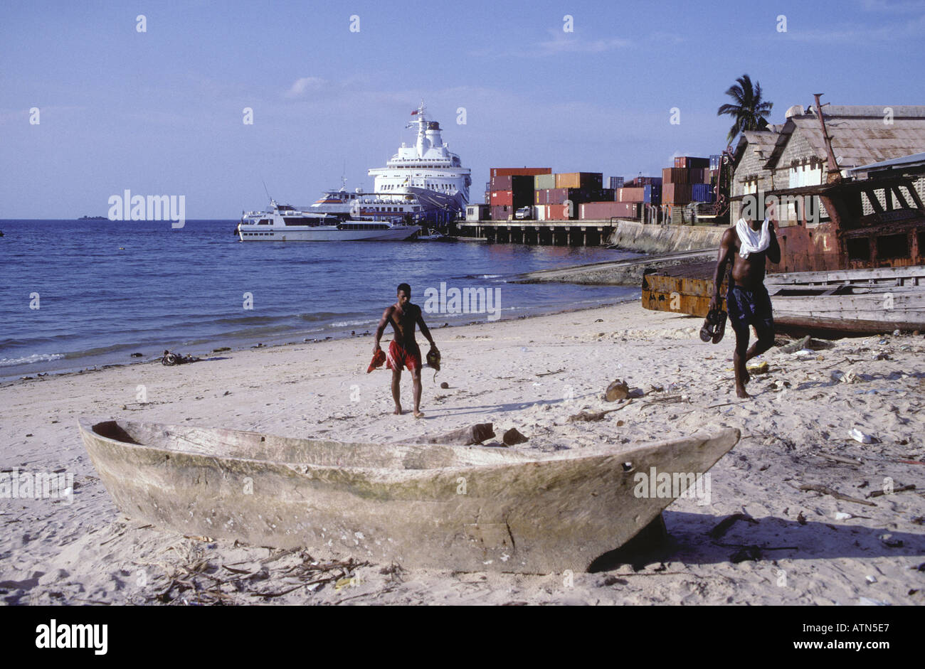 Two young black African men after a swim Zanzibar Tanzania East Africa ...