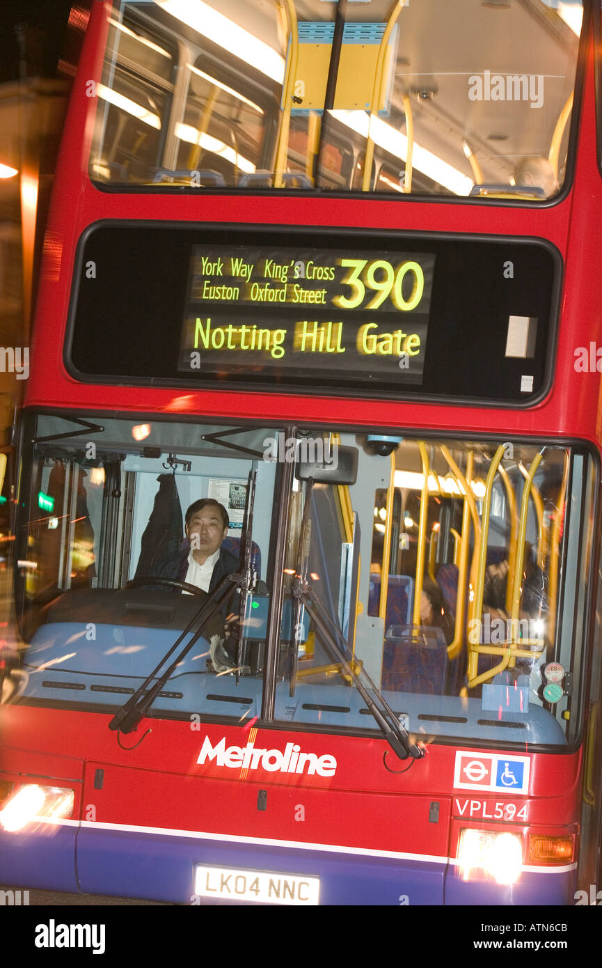 a london bus at night Stock Photo - Alamy