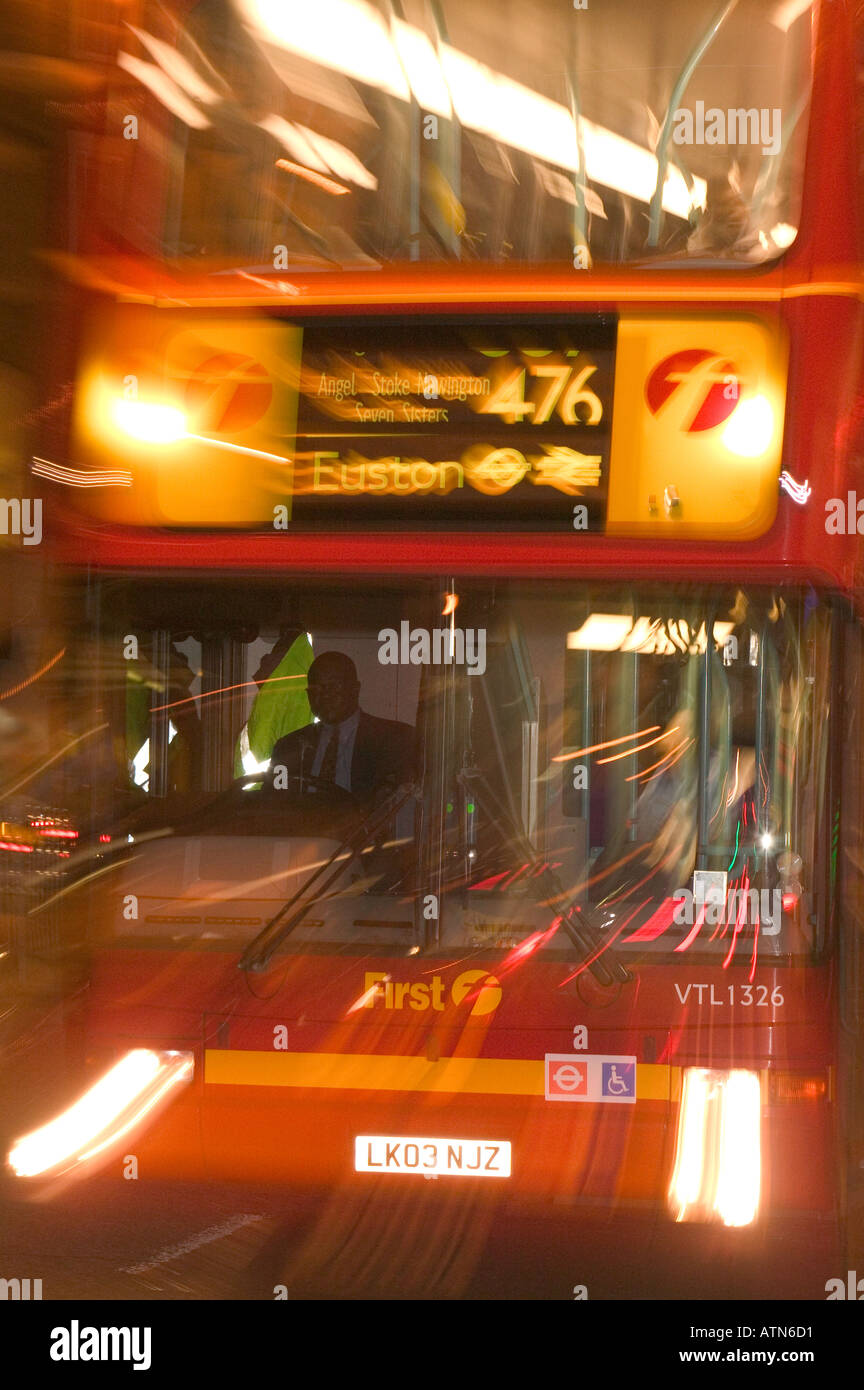 a london bus at night Stock Photo - Alamy