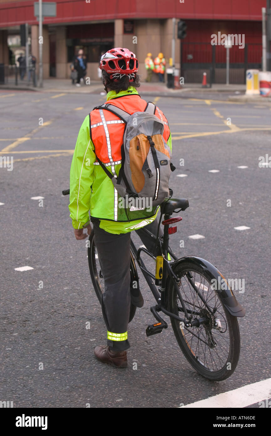 cyclist waiting at trafic lights euston road london Stock Photo - Alamy