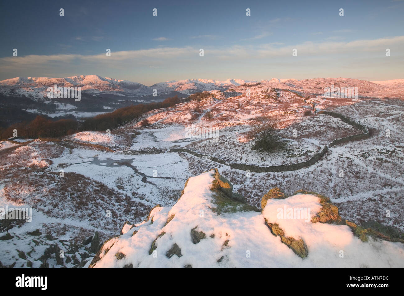 Coniston fells in snow at dawn Stock Photo - Alamy