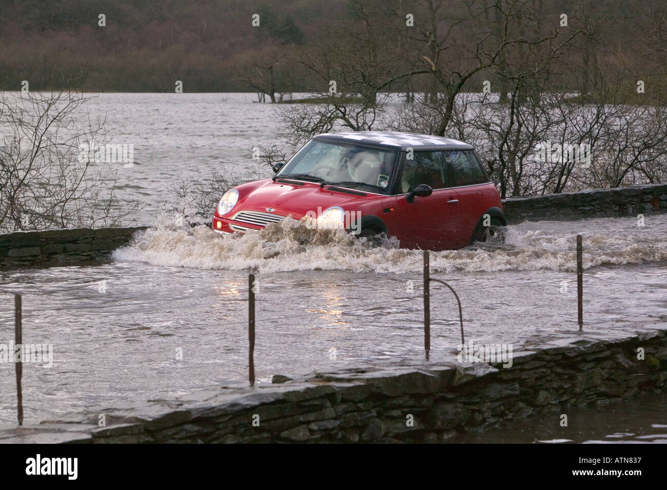 Driving through rain storm water hi-res stock photography and images ...