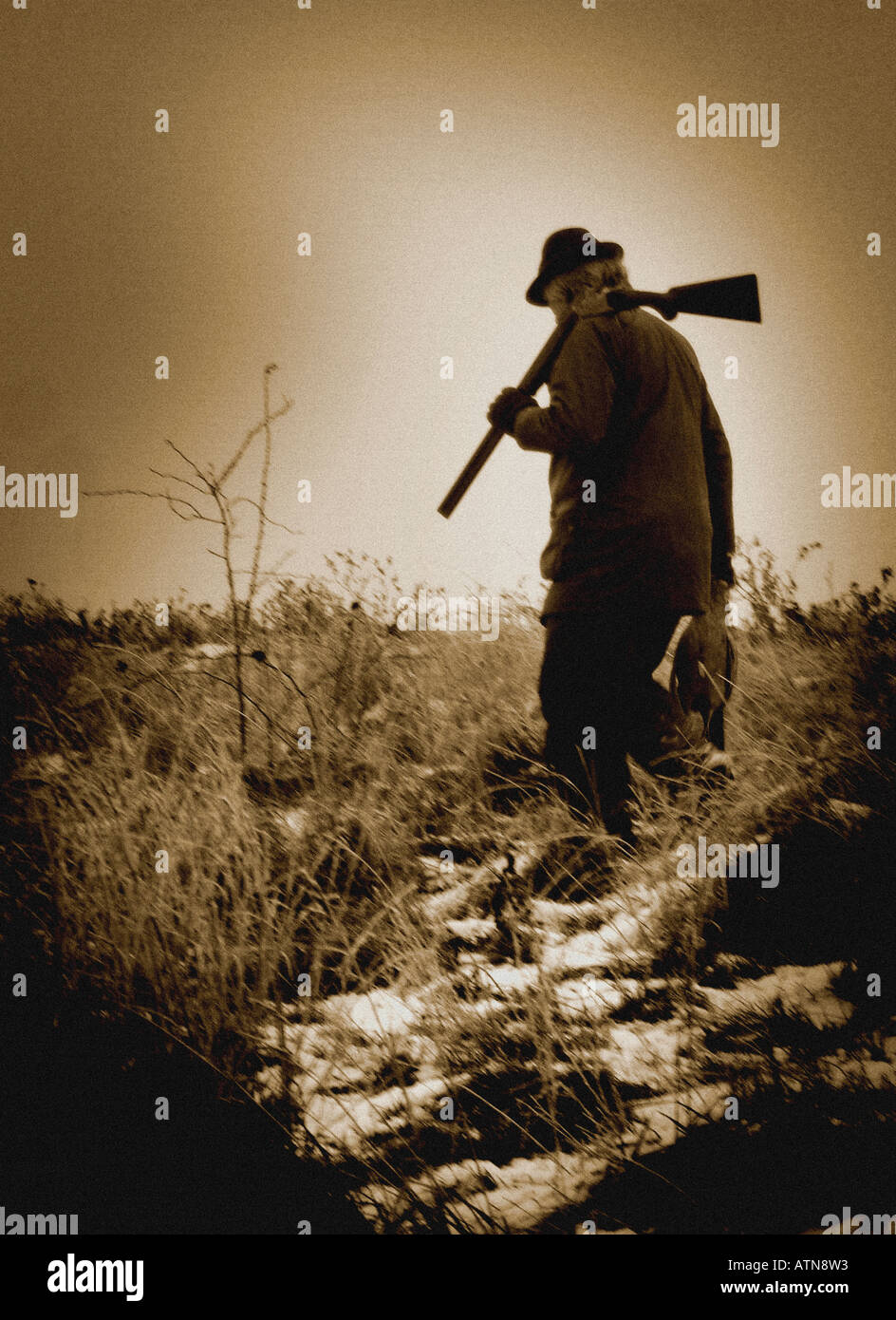 Man carrying gun hi-res stock photography and images - Alamy