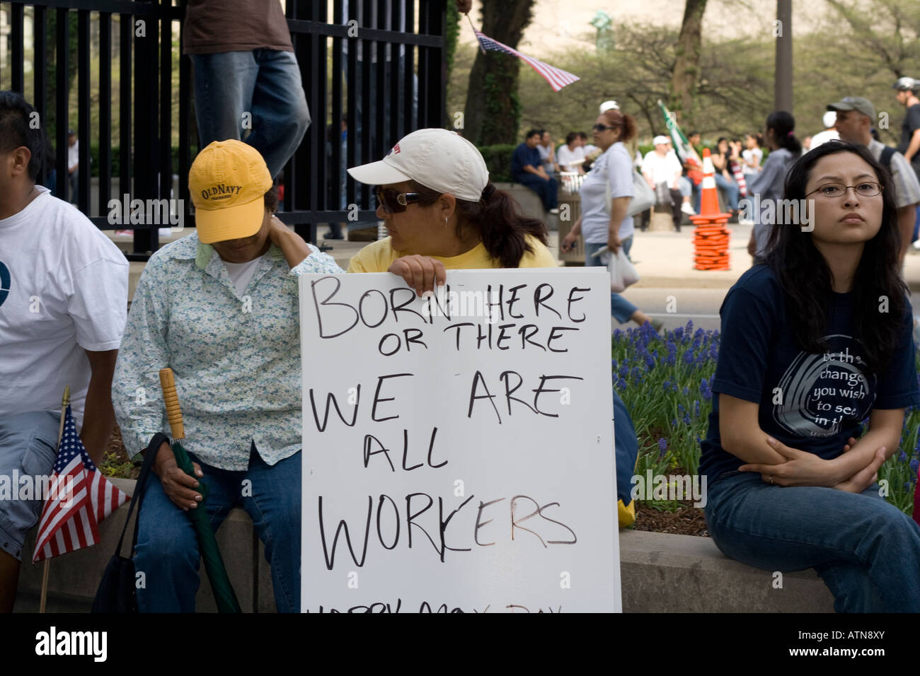Chicago Illinois immigration rally people holding sign saying we are ...