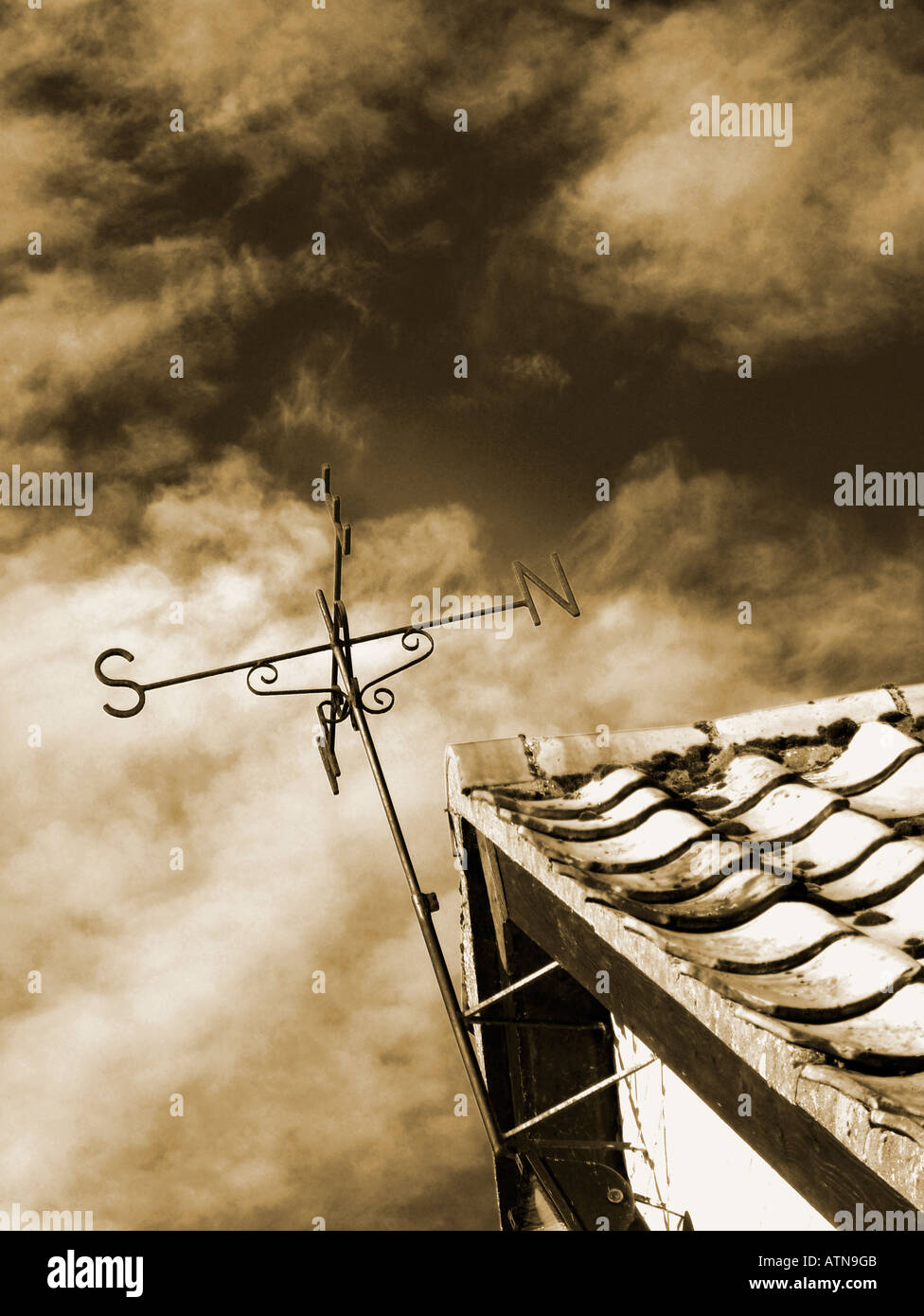 roof top wind vane Stock Photo - Alamy
