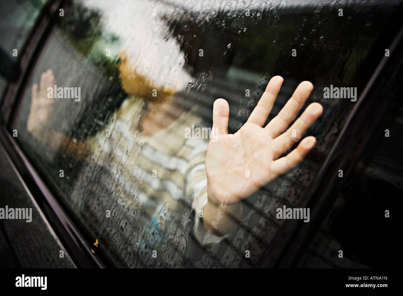 Hand at car window Stock Photo - Alamy