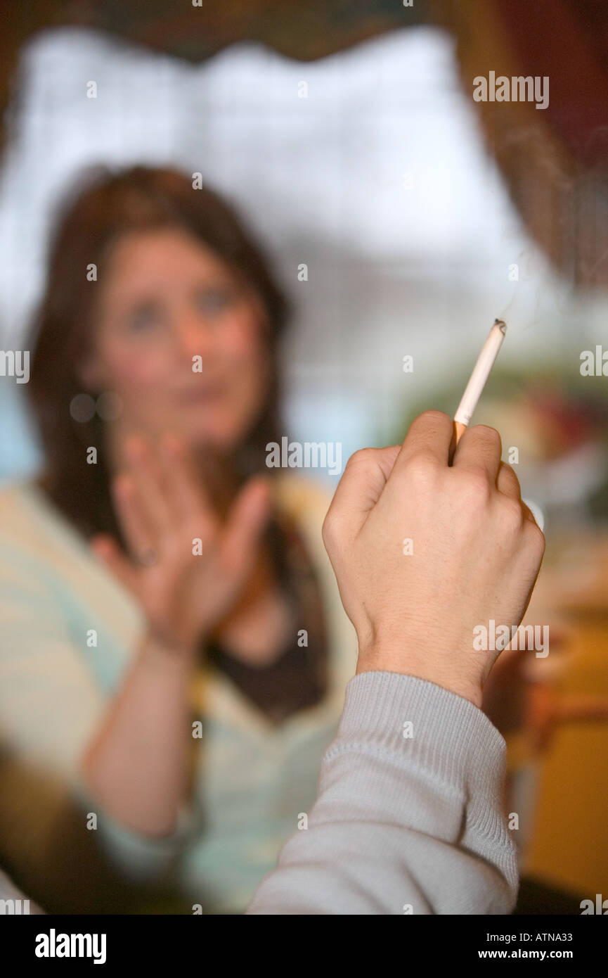 women objecting to a smoker in a pub Stock Photo - Alamy