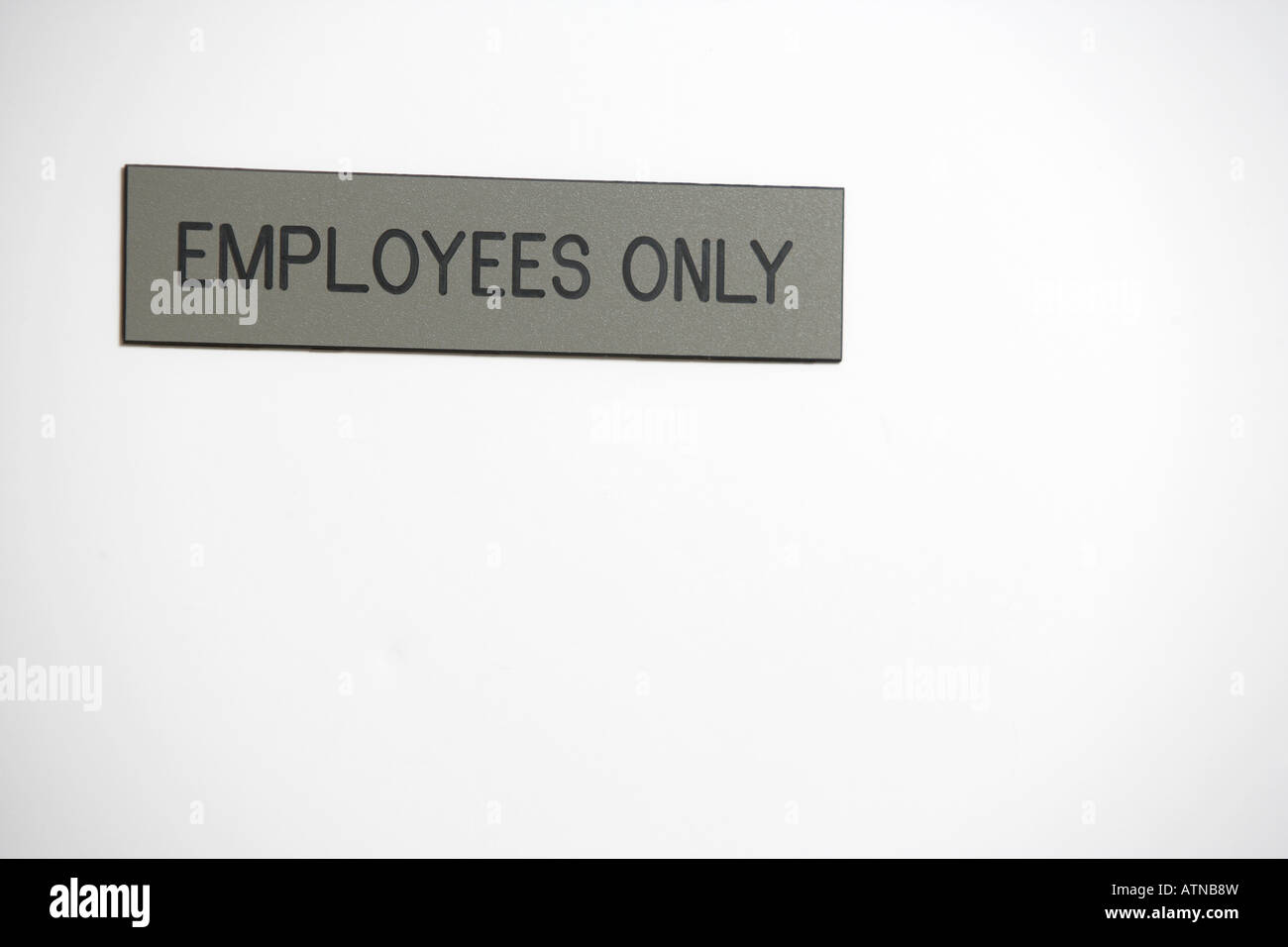 Employess Only Sign in a hallway Stock Photo - Alamy