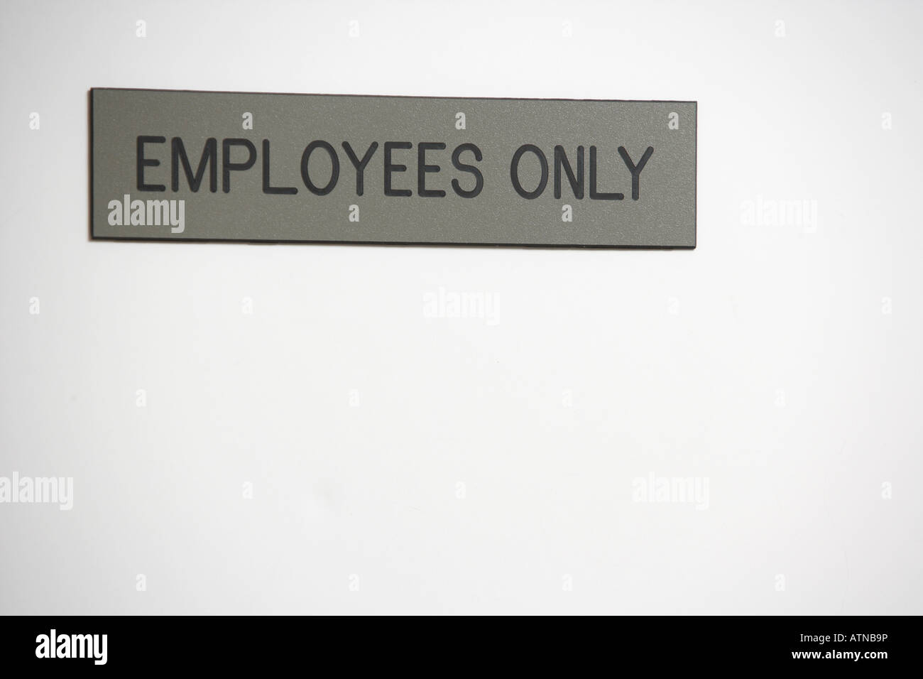 Employess Only Sign in a hallway Stock Photo - Alamy