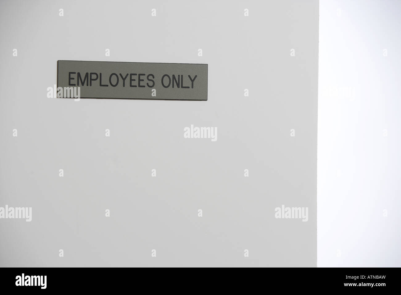 Employess Only Sign in a hallway Stock Photo - Alamy