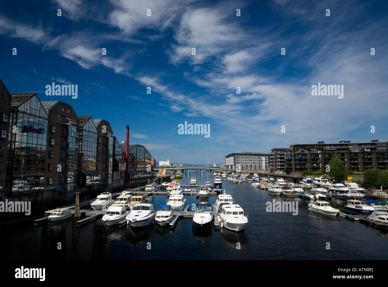 boats parked at Nidelva river Stock Photo - Alamy