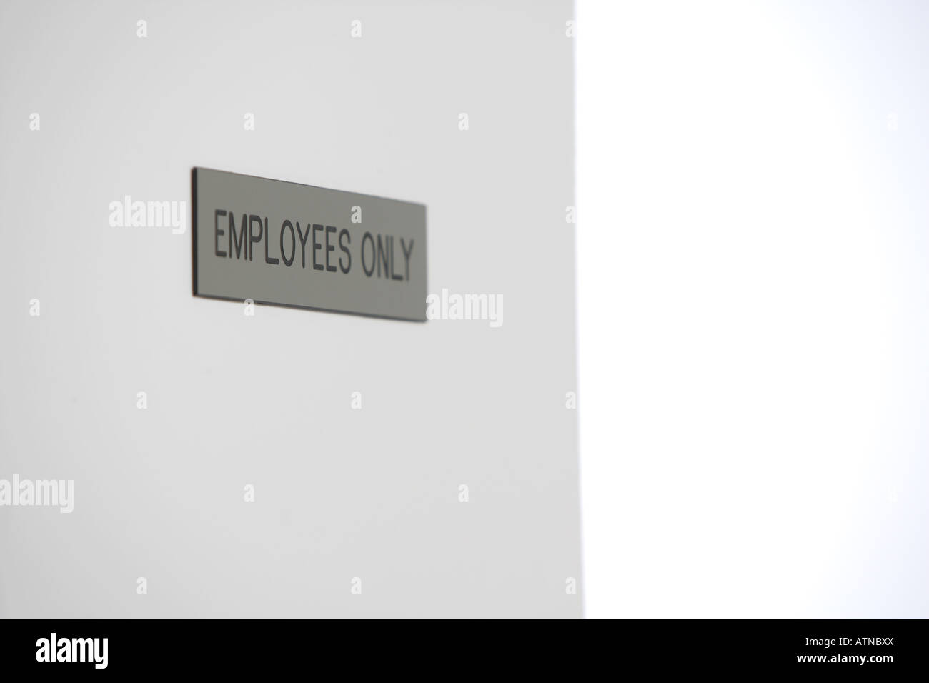 Employess Only Sign in a hallway Stock Photo - Alamy