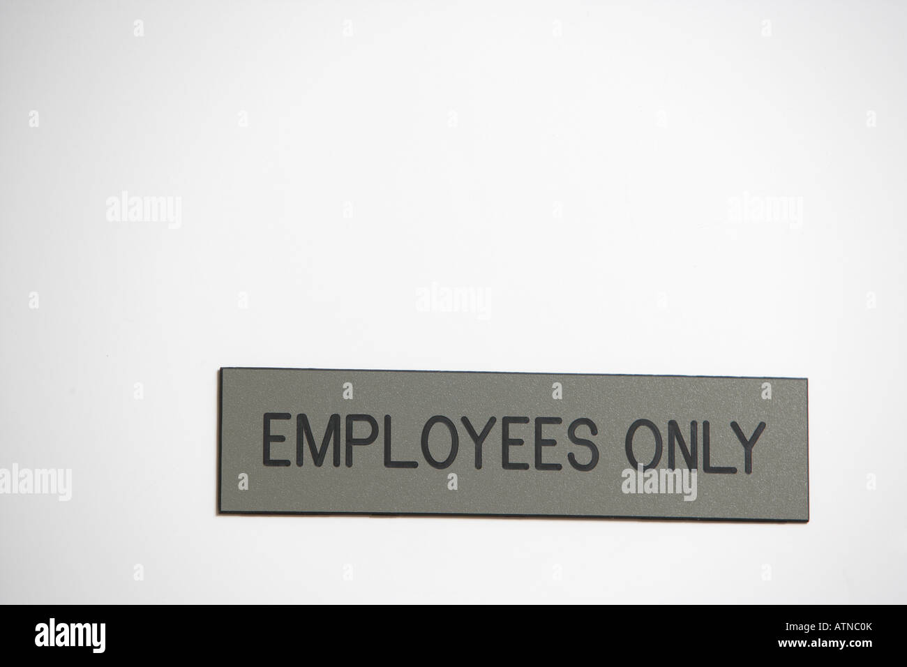 Employess Only Sign in a hallway Stock Photo - Alamy