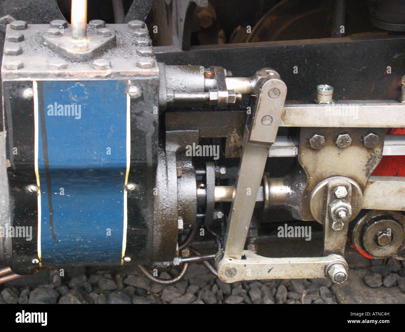 driving pistons miniature narrow gauge steam train Stock Photo - Alamy