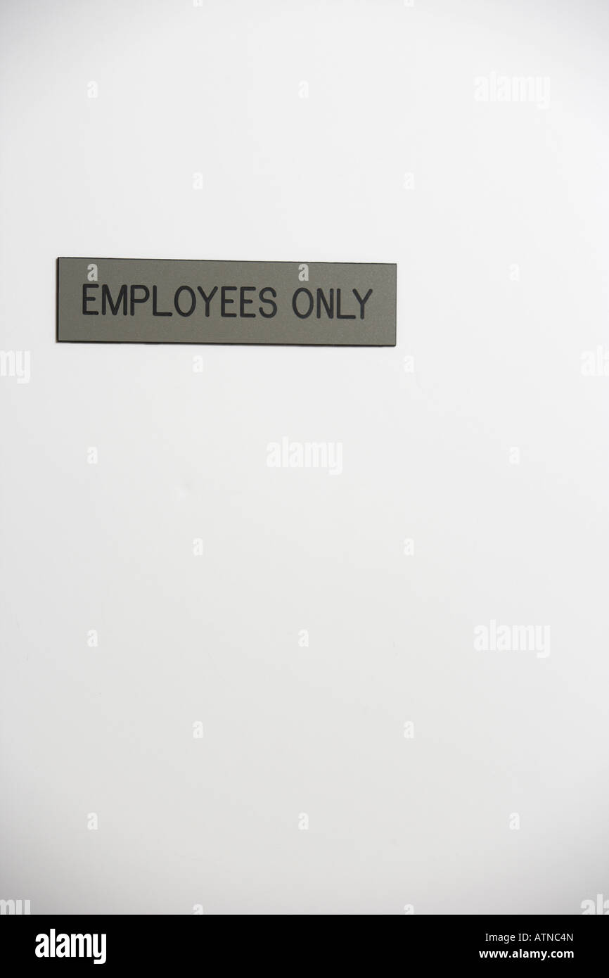 Employess Only Sign in a hallway Stock Photo - Alamy
