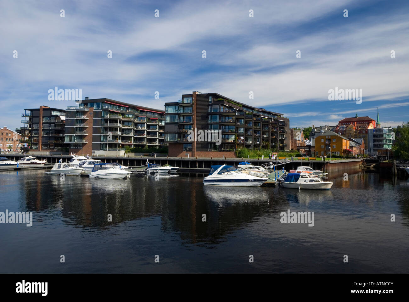 boats parked at Nidelva river Stock Photo - Alamy