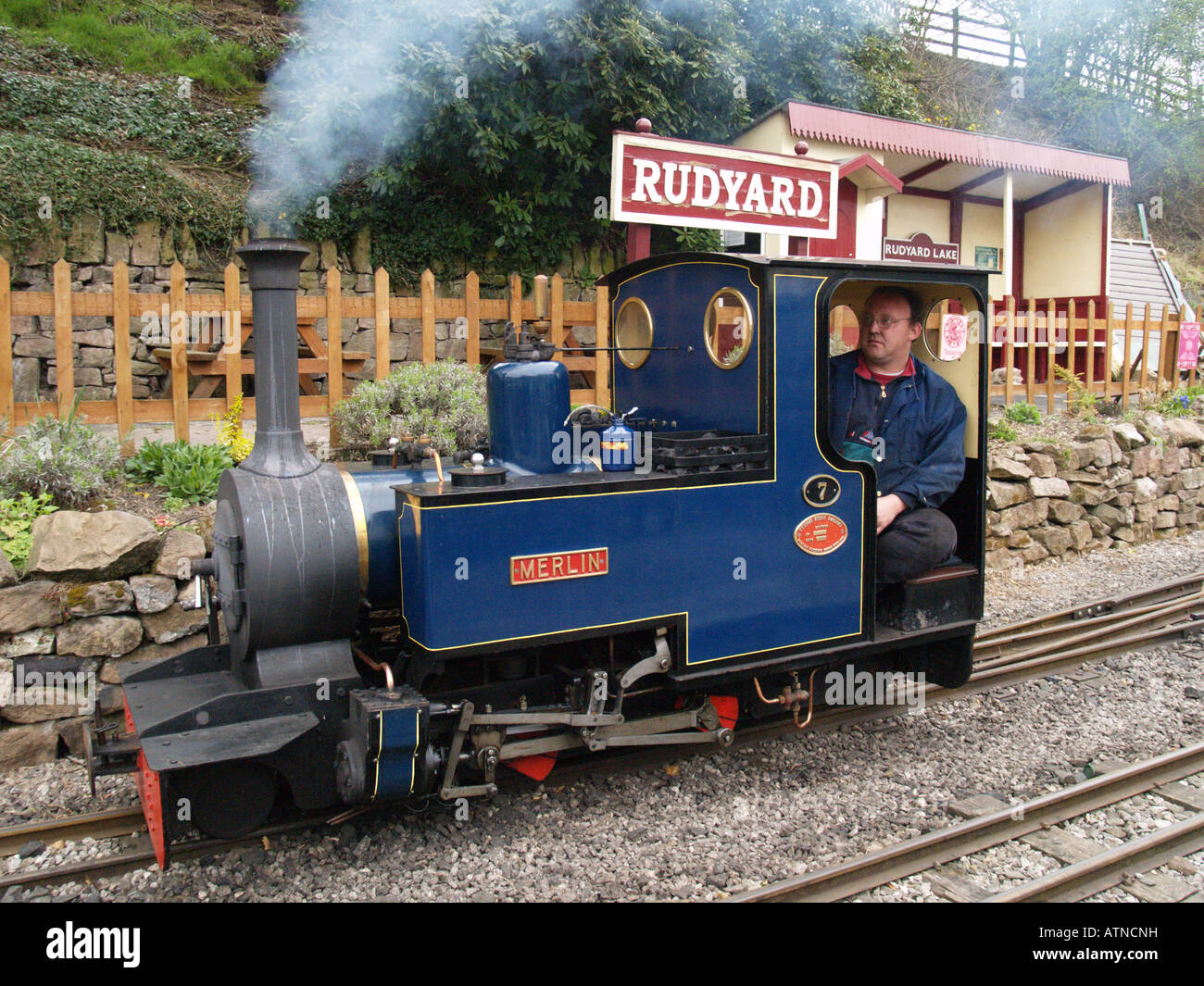 driver working miniature narrow gauge steam train Stock Photo - Alamy