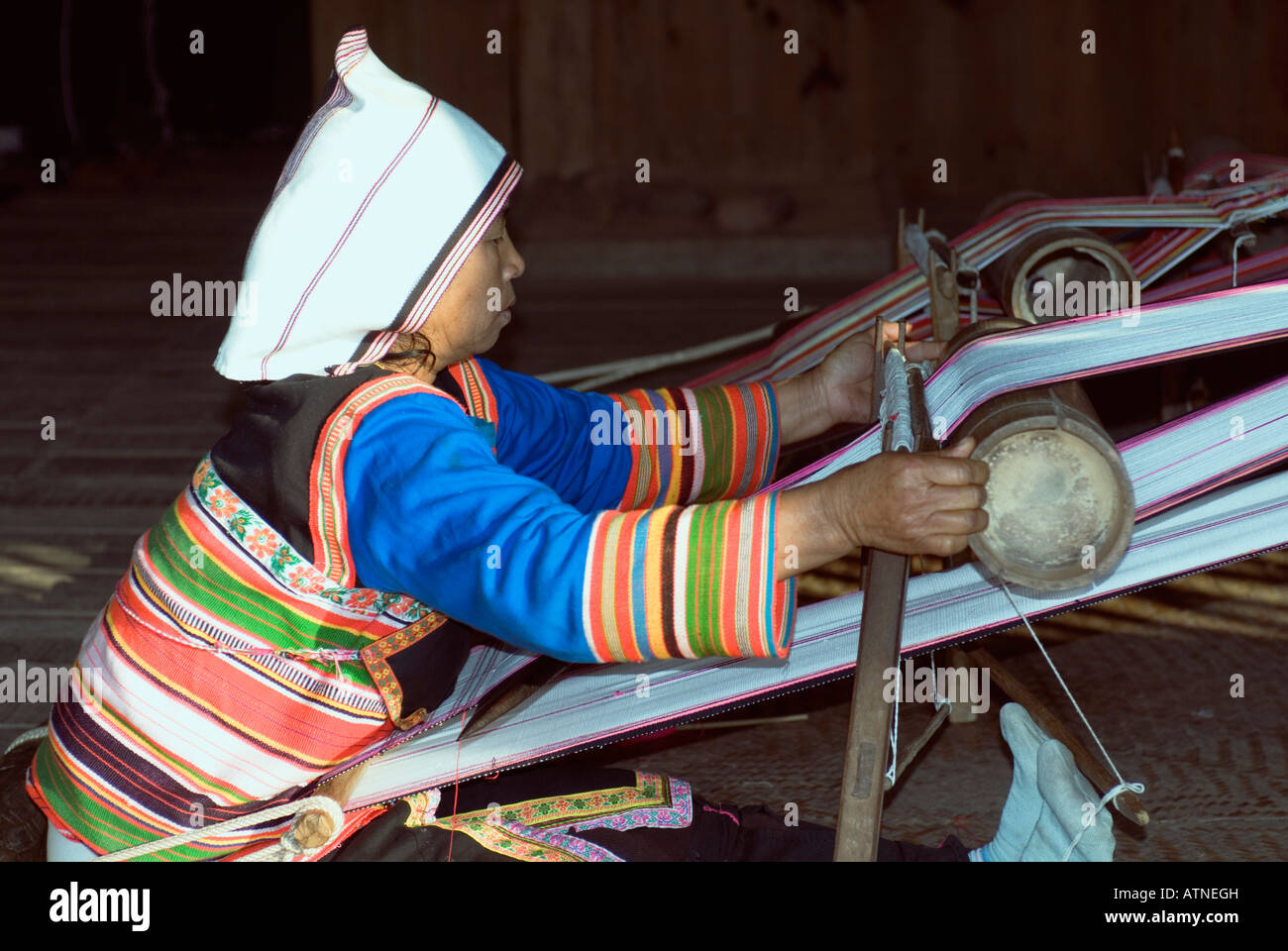 China, Jinuo Woman Weaving, Xishuangbanna, Mt Jinuo, Yunnan Province ...