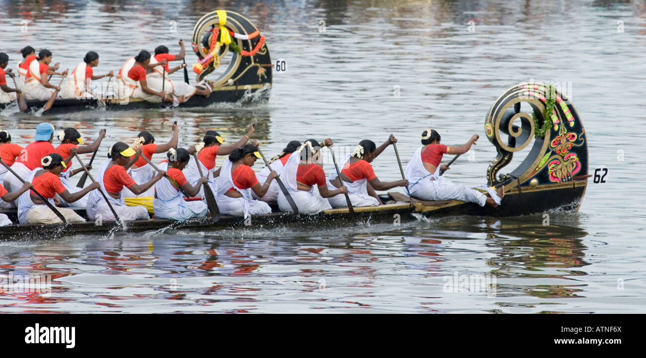 Group of people participating in a snake boat racing, Kerala, India ...
