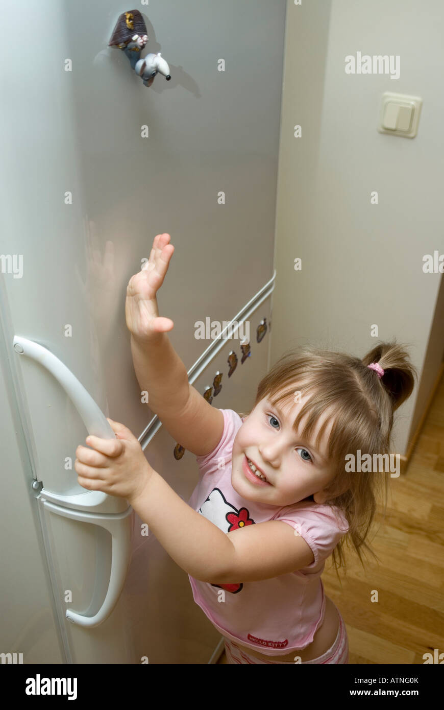 Girl reaching out Stock Photo - Alamy