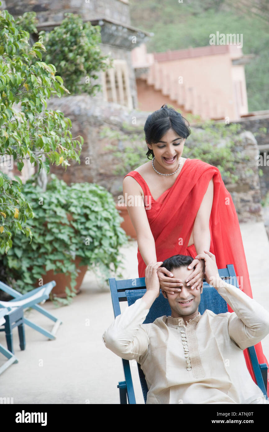 Indian man standing from behind hi-res stock photography and images - Alamy