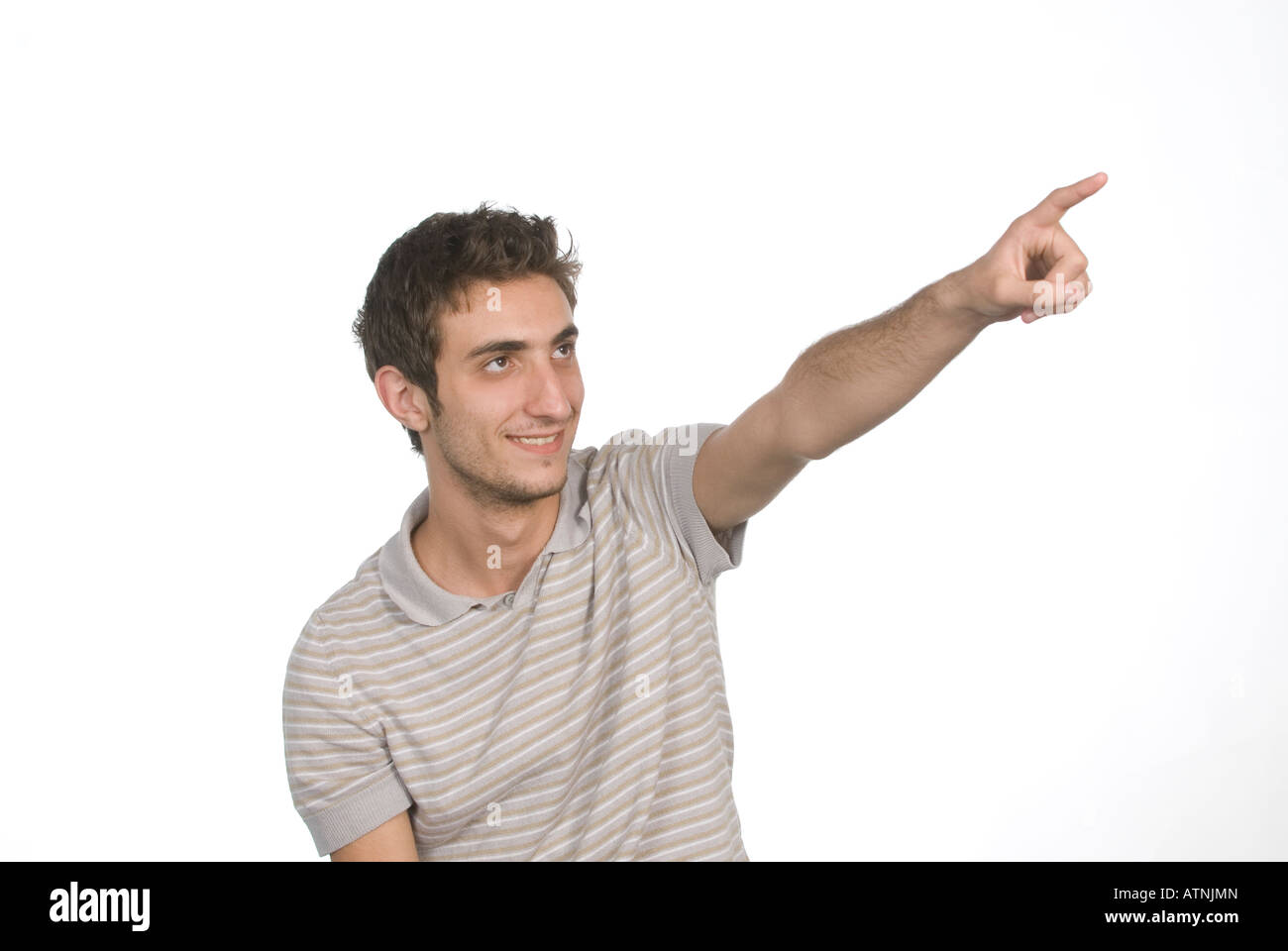 Young man pointing up Stock Photo - Alamy