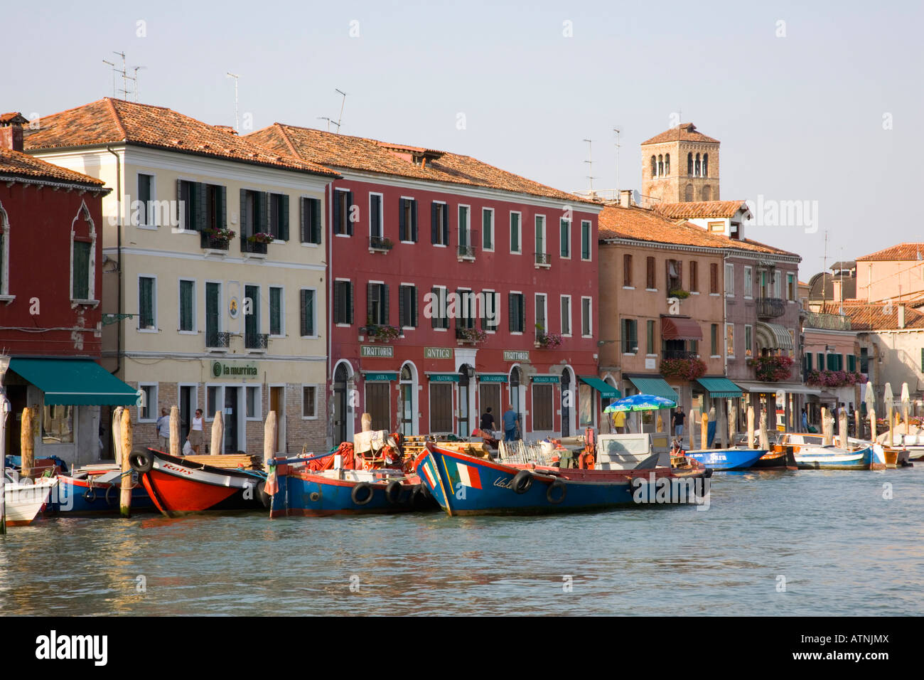 Murano, Venice, Veneto, Italy. View across canal to traditional ...