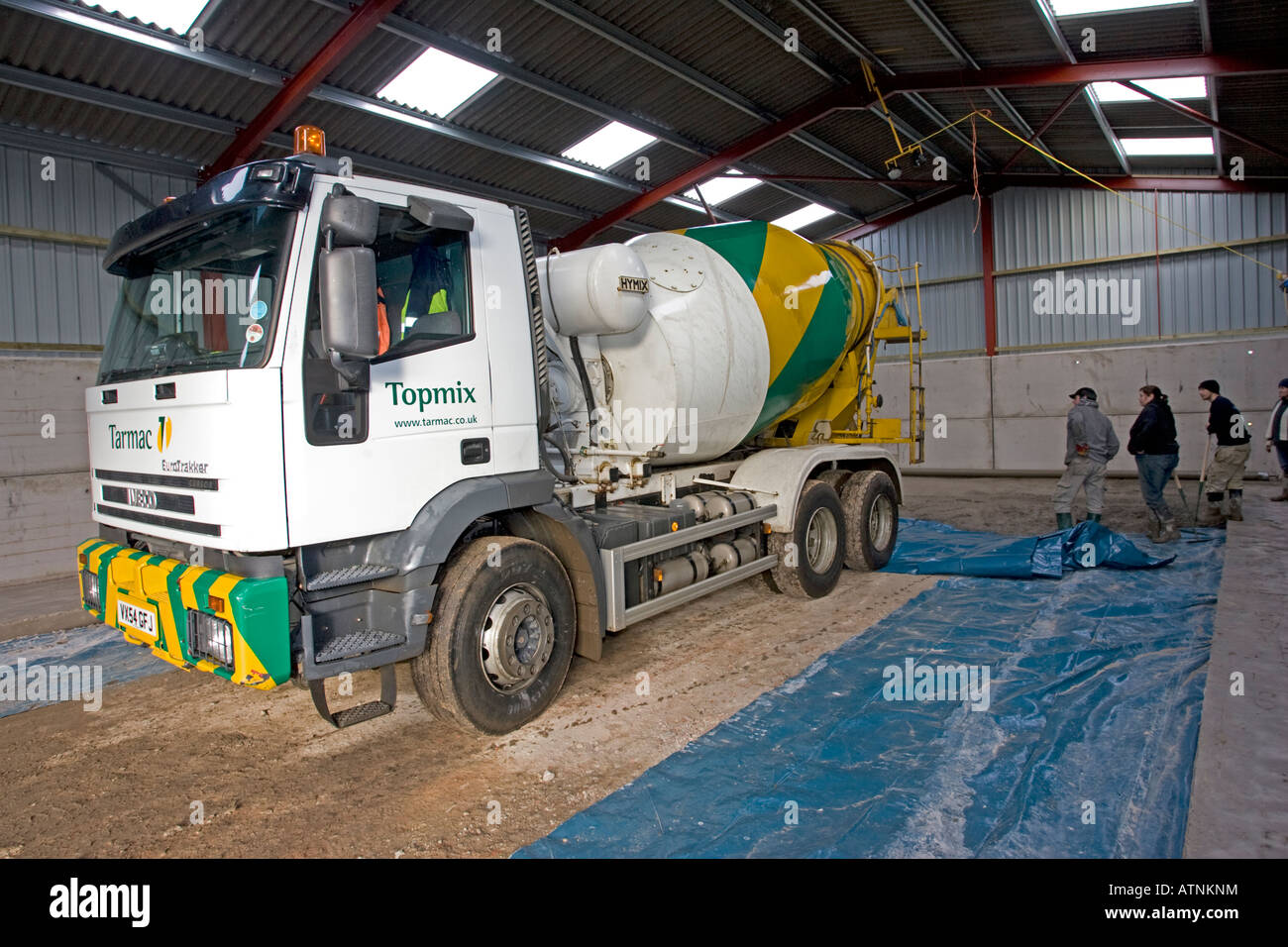 Cement lorry unloading cement for barn floor Cotswolds UK Stock Photo ...