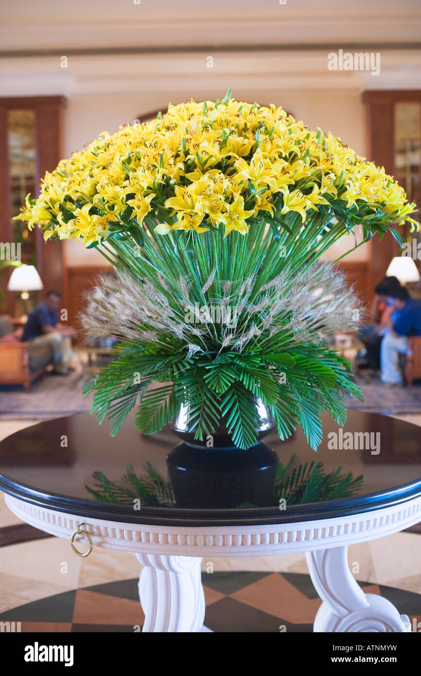 Close-up of a flower vase on a table at a hotel reception Stock Photo ...