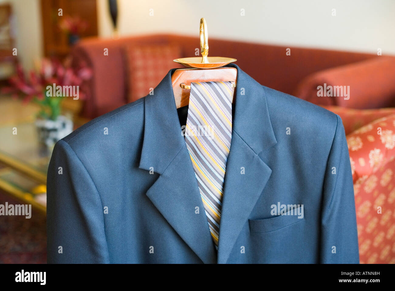 Hanging suit hi-res stock photography and images - Alamy