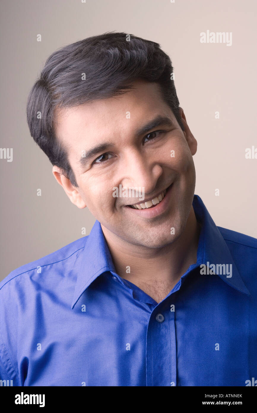 Portrait of a mid adult man smiling Stock Photo - Alamy