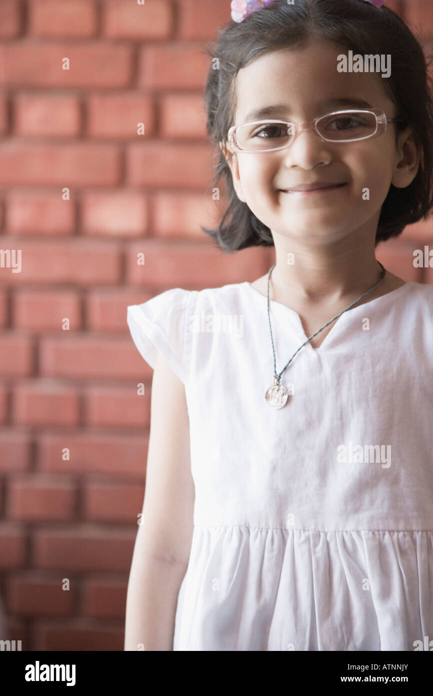 Portrait of a girl smirking Stock Photo - Alamy