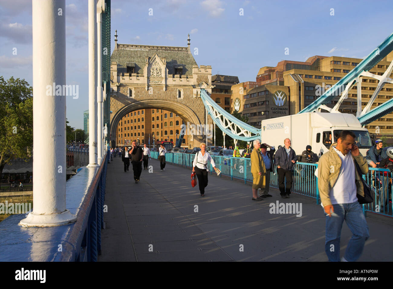 Commuters crossing "Tower Bridge" London UK Stock Photo - Alamy