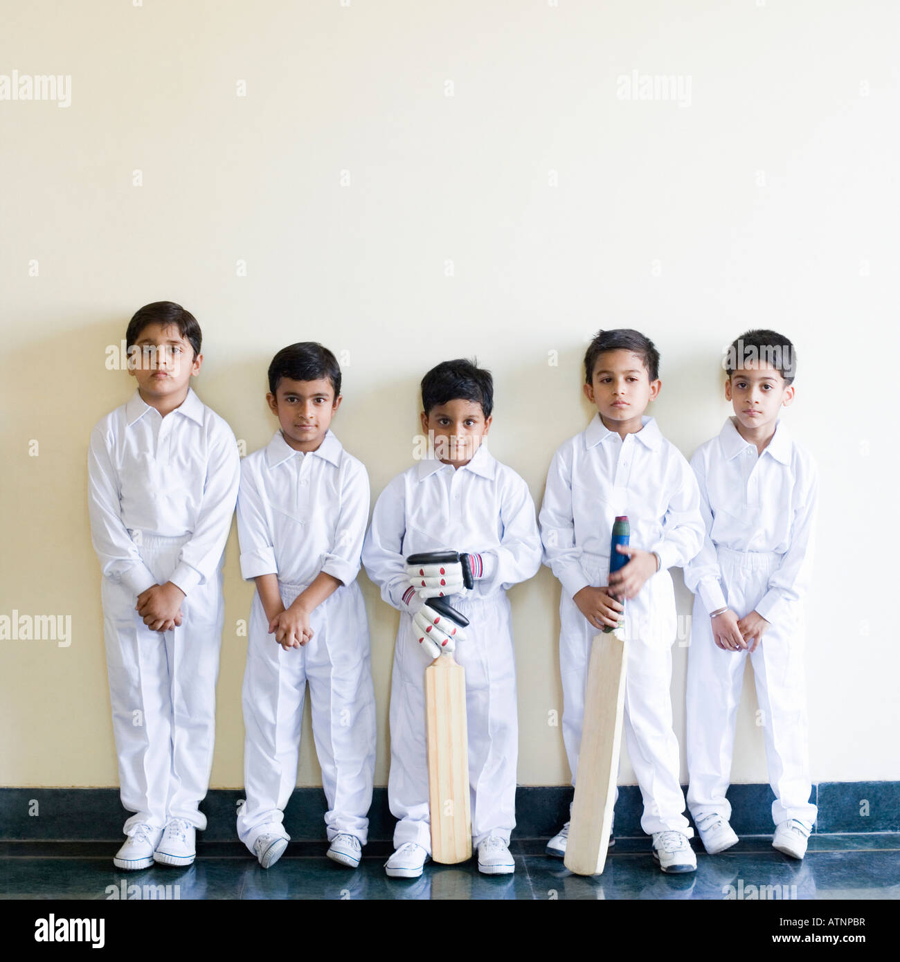 Portrait of five boys standing in a row Stock Photo - Alamy