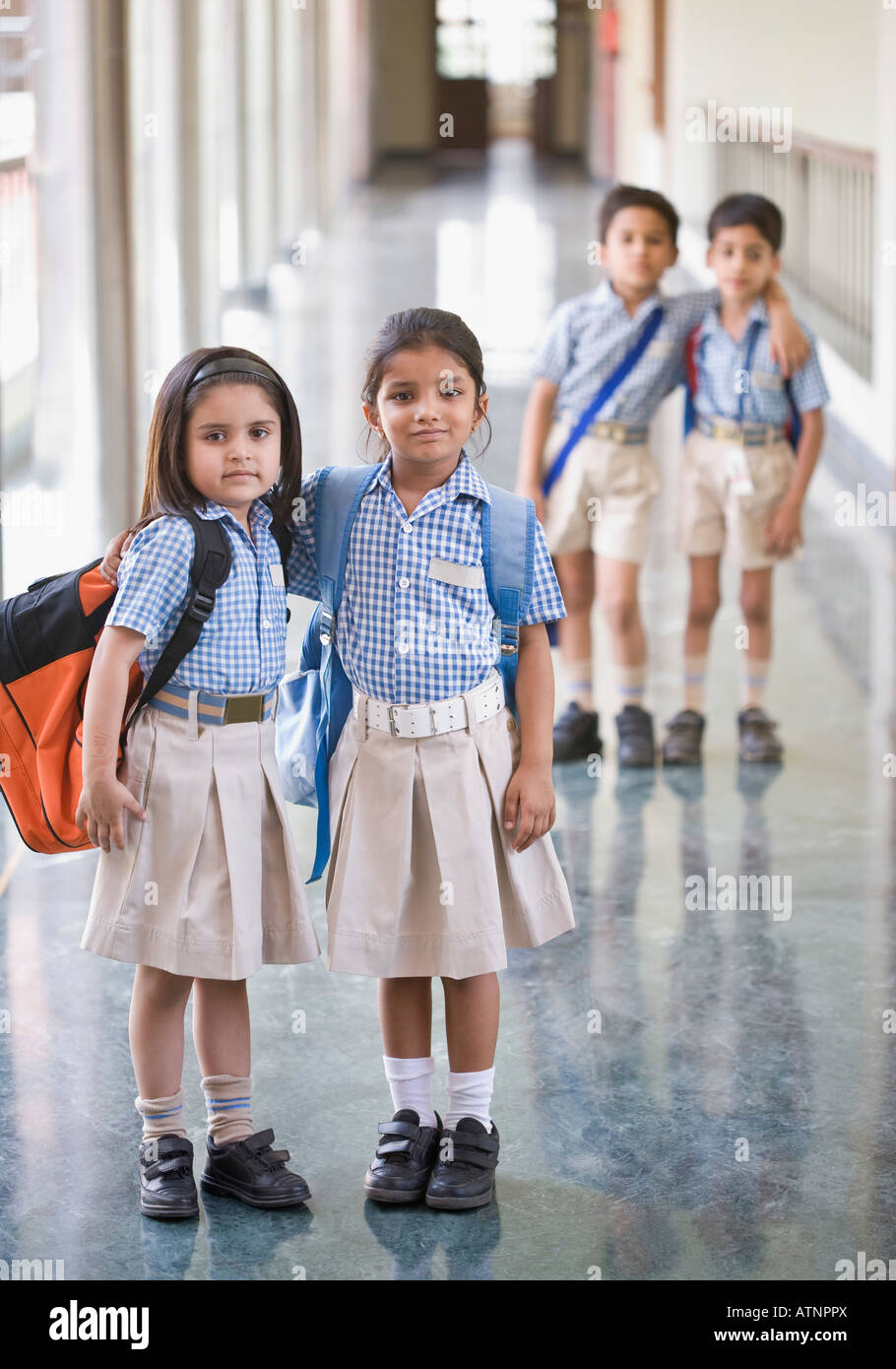 Portrait schoolgirls standing in front hi-res stock photography and ...