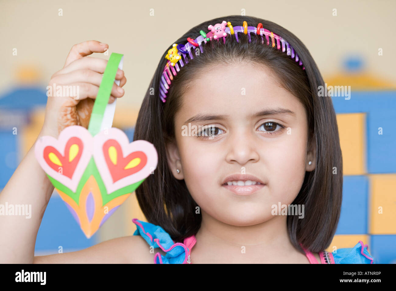 Portrait girl holding paper craft hi-res stock photography and images ...