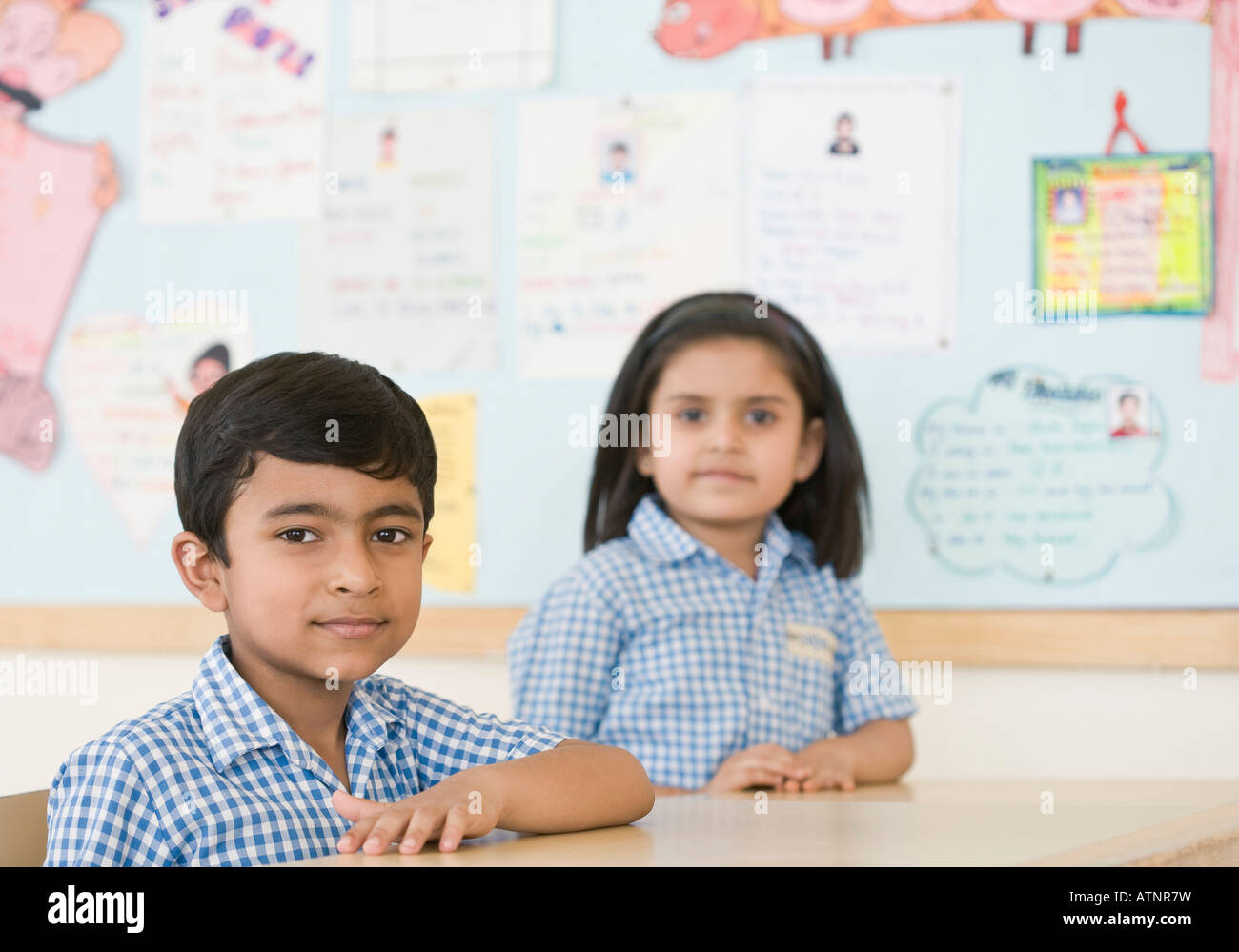 Two school children in a classroom Stock Photo - Alamy