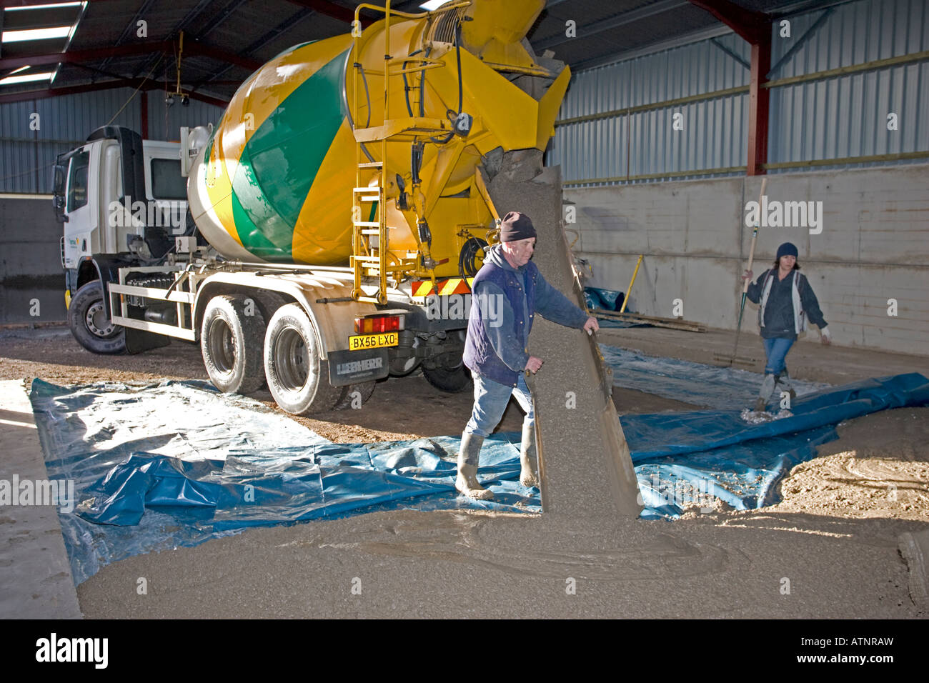 Cement lorry unloading cement for barn floor Cotswolds UK Stock Photo ...