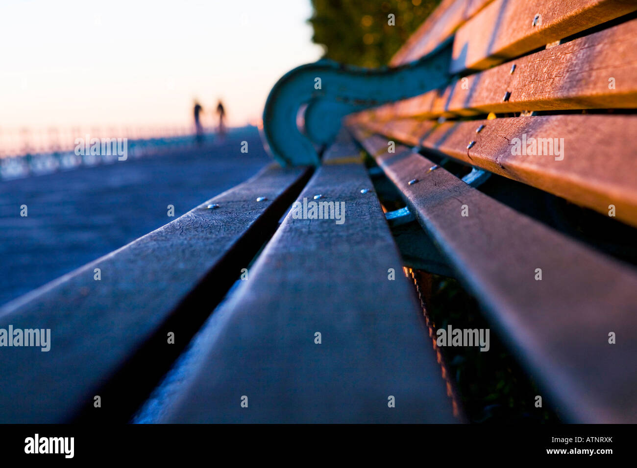 Lovers walk along the Promenade together at sunset Stock Photo - Alamy