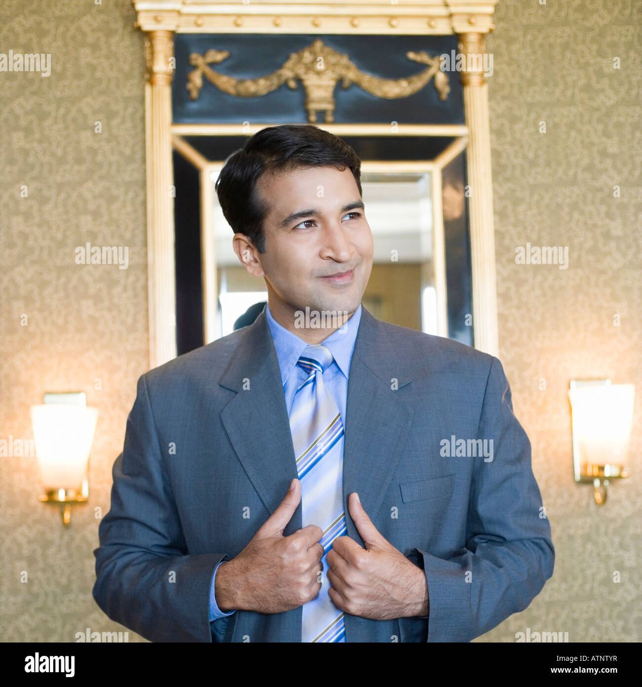 Smirking man in suit hi-res stock photography and images - Alamy