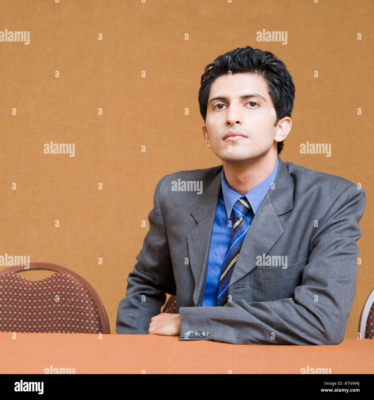 Indian businessman serious chair hi-res stock photography and images ...