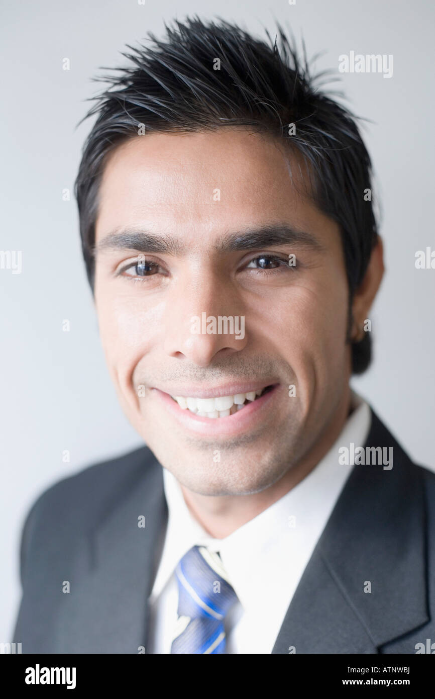 Portrait of a businessman smiling Stock Photo - Alamy