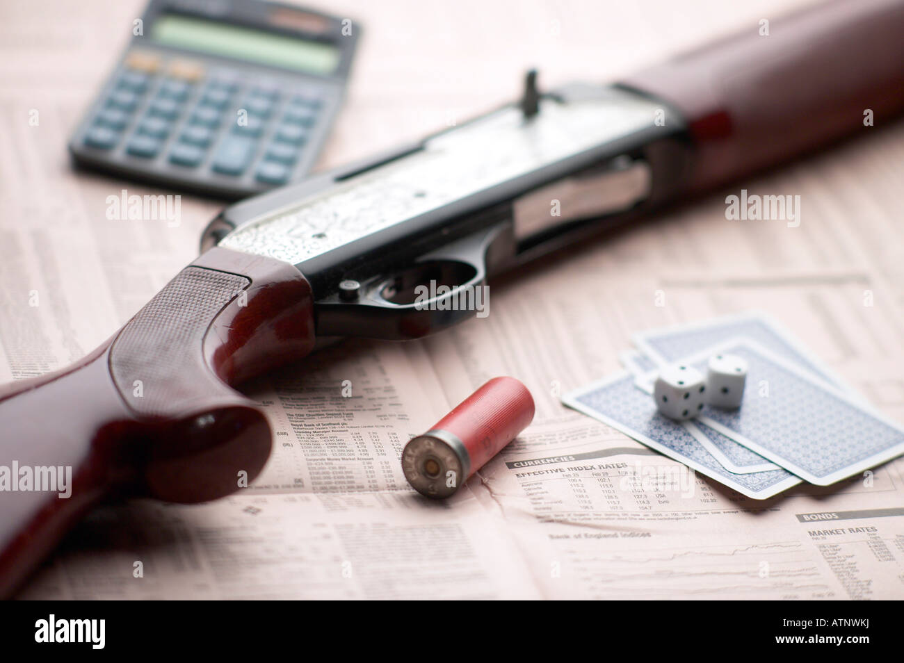 STILL LIFE WITH GUN,FINANCIAL NEWSPAPER,CALCULATOR,DICE,CARDS AND ...