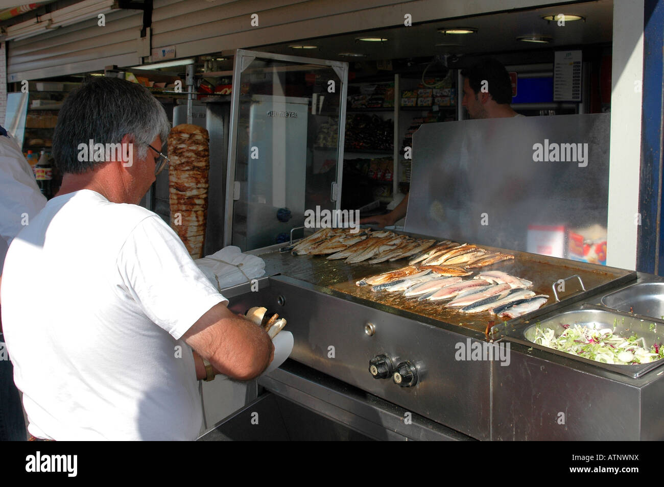 Grilling fish hi-res stock photography and images - Alamy