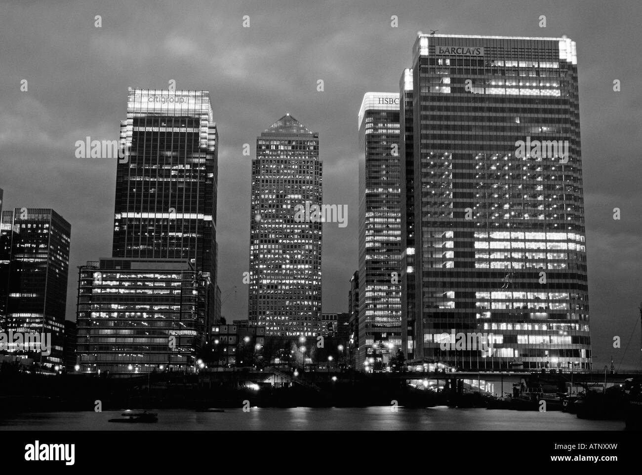 london docklands canary wharf high rise tower blocks night reflections ...