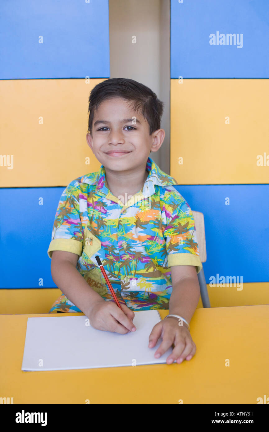 Child smirking hi-res stock photography and images - Alamy